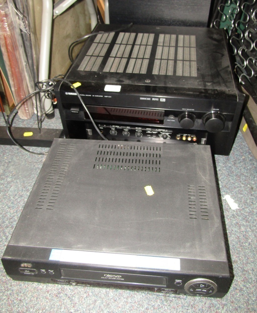 A Yamaha Natural Sound AV amplifier, DSP-AX1, JVC video player, and a ...