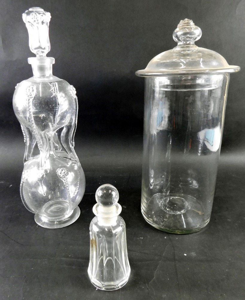 An early 20thC cut glass inverted decanter, with shaped stopper, double ...