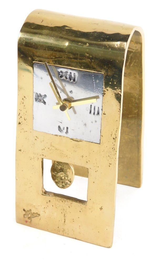 A 20thC gilt brass mantel clock, of arched form with square silvered dial with Roman numerals ...