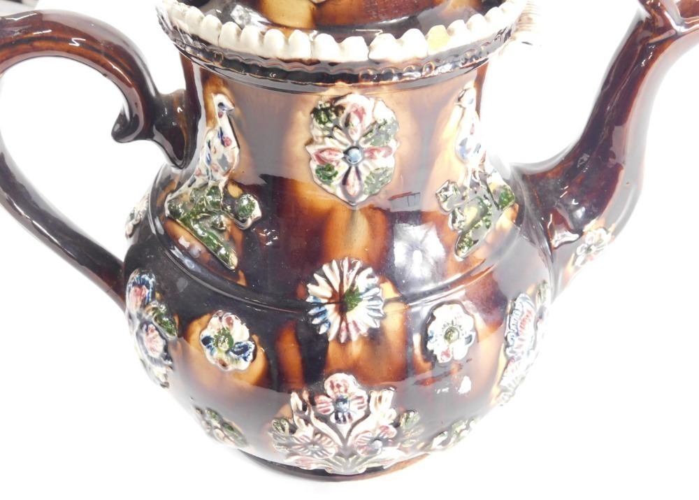 A Bargeware treacle glazed pottery teapot, the domed lid with teapot ...