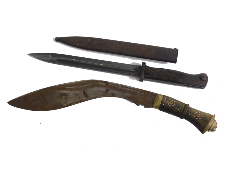 An early 20thC bayonet, the shaped blade marked 4568C S238G, the turned ...