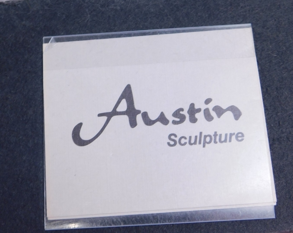 After Muci. Art Nouveau figure of a ballet dancer with raised arms, on ...