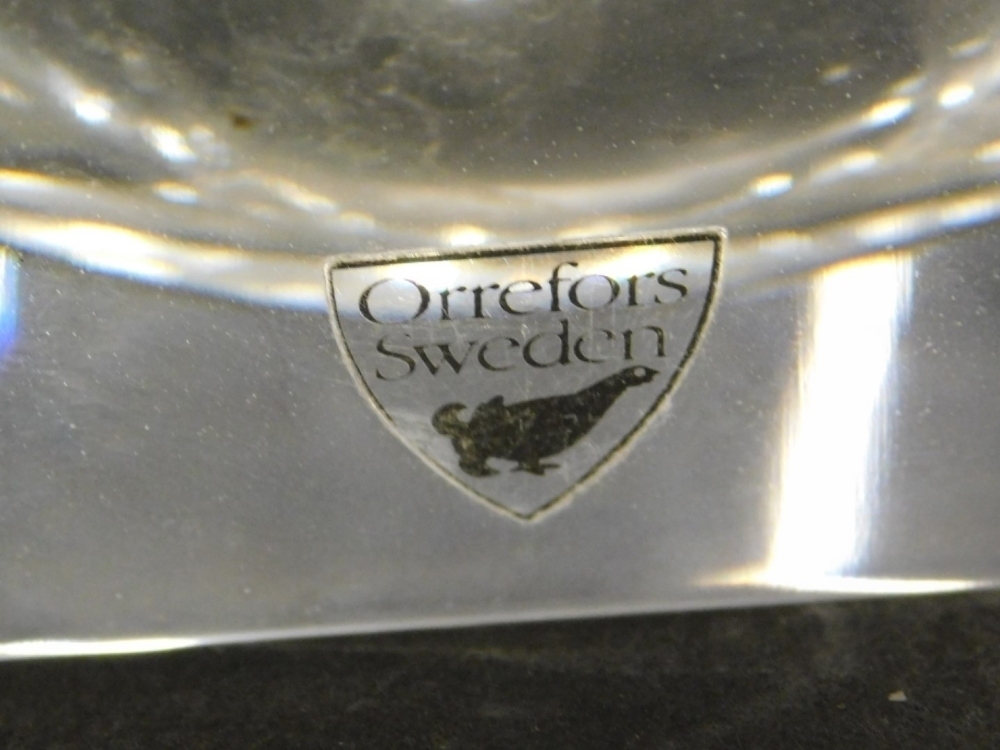 A Orrefors Swedish glass bowl, of plain octagonal form, signature mark ...
