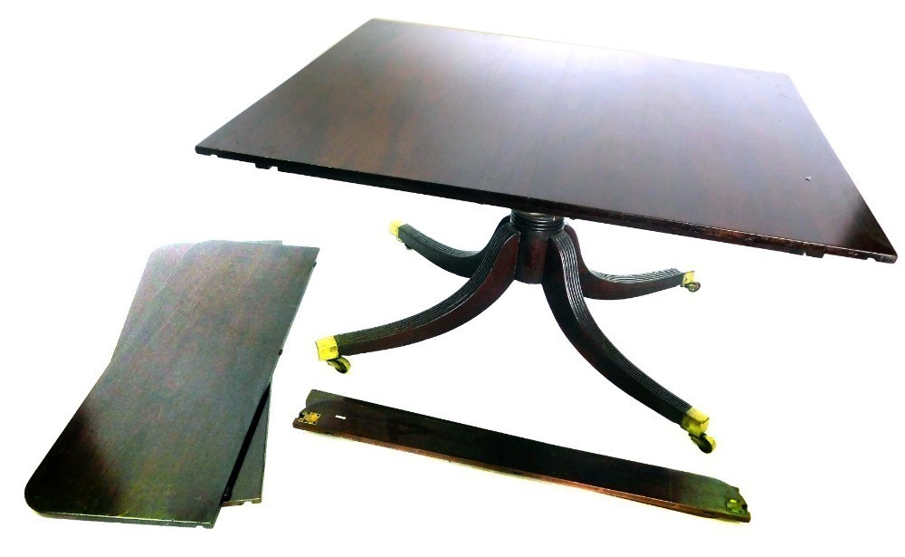 A 19thC mahogany extending dining table, the rectangular top with ...