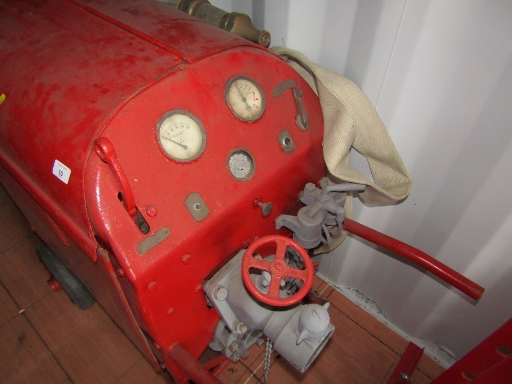 A vintage portable fire pump tender.