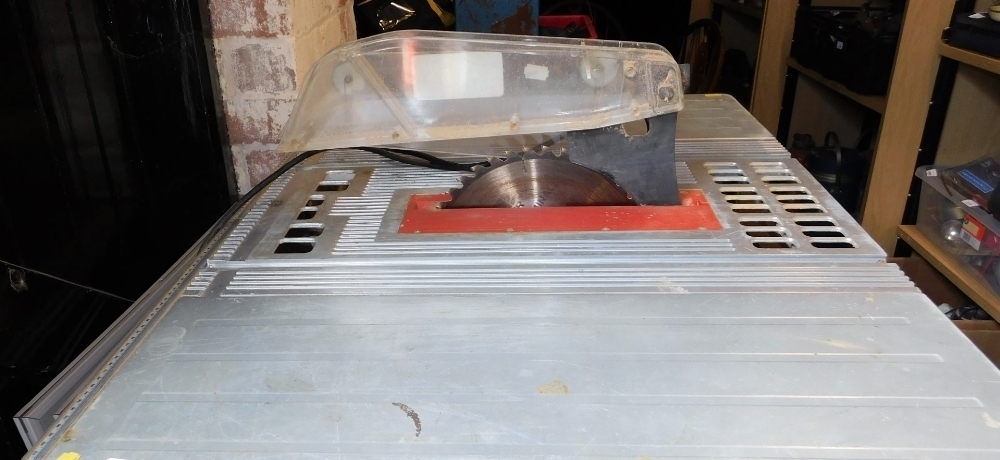 A Clarke Woodworker ten inch table saw.