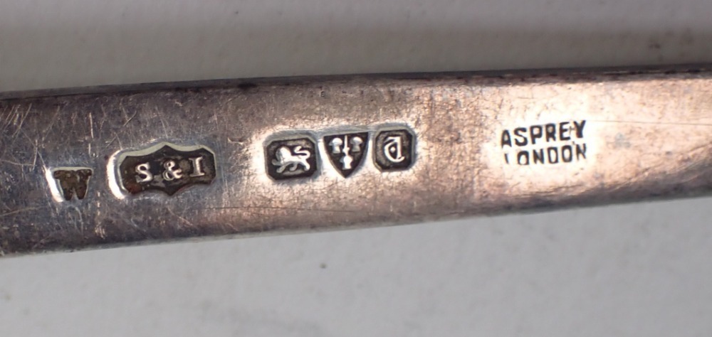 A George V silver letter opener, with fox mask head, Chester 1926 ...