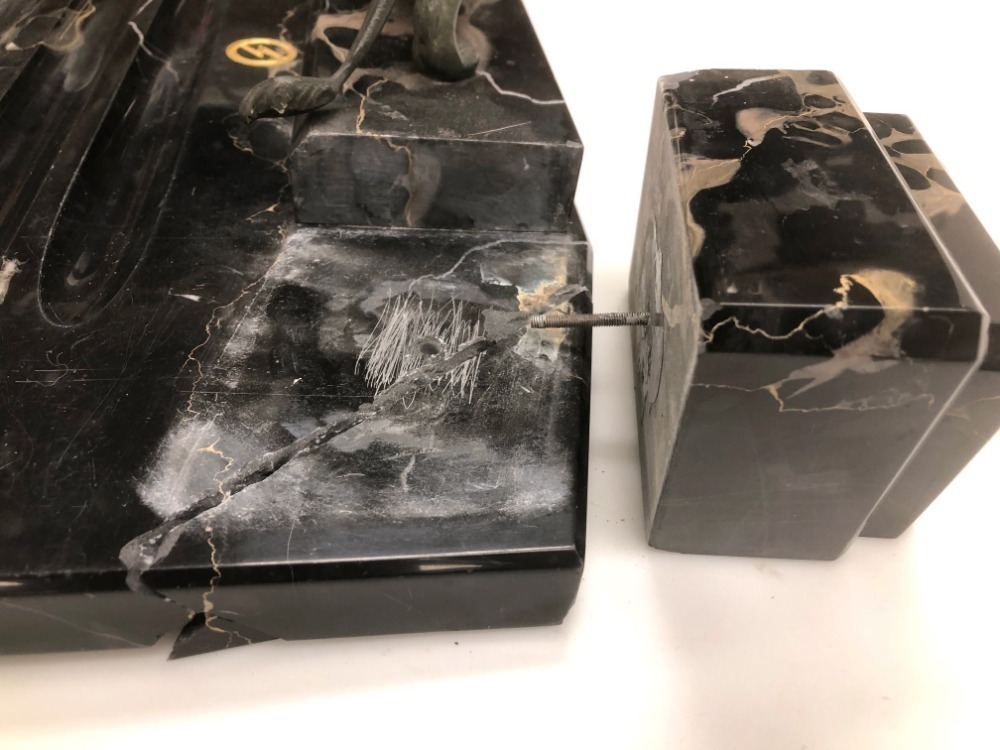 Political interest. A large variegated black marble desk stand with ...