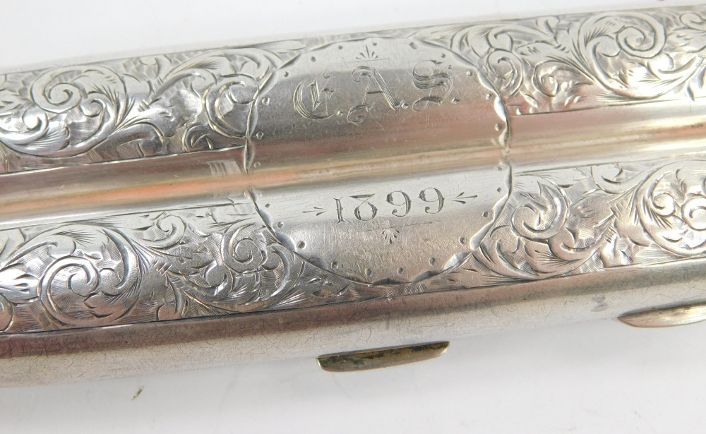 A Victorian silver cigar case, to enclose two cigars with scroll engine ...