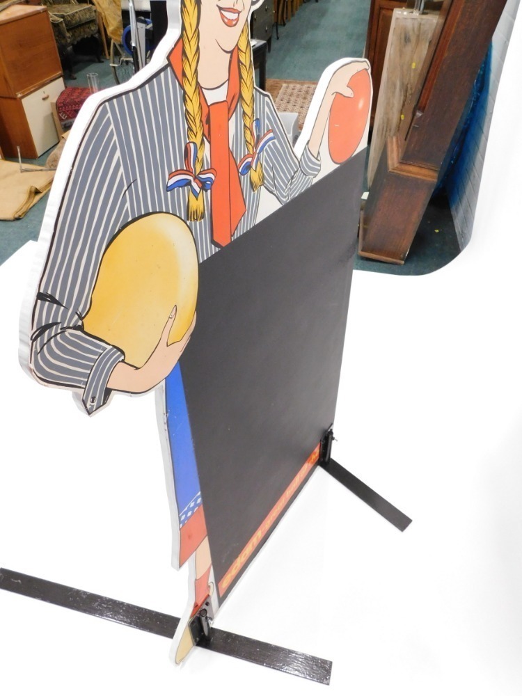 A late 1970s advertising notice sign for Edam cheese, decorated with a ...