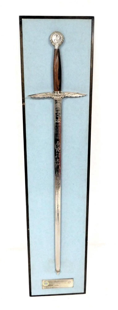 A Wilkinson's commemorative sword for the Battle of Britain, the wooden ...