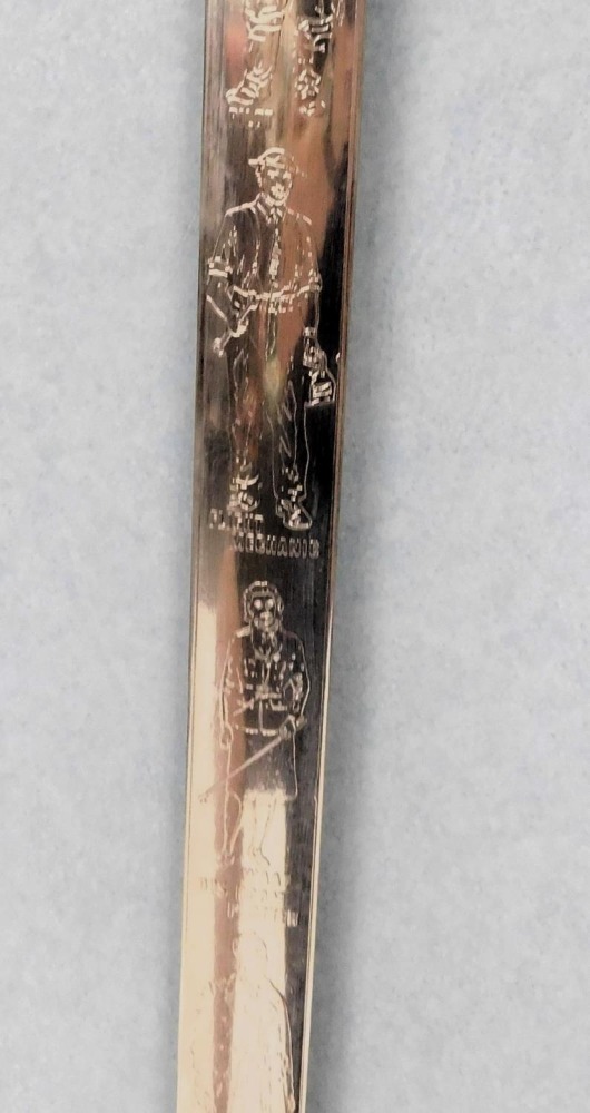 A Wilkinson's commemorative sword for the Battle of Britain, the wooden ...