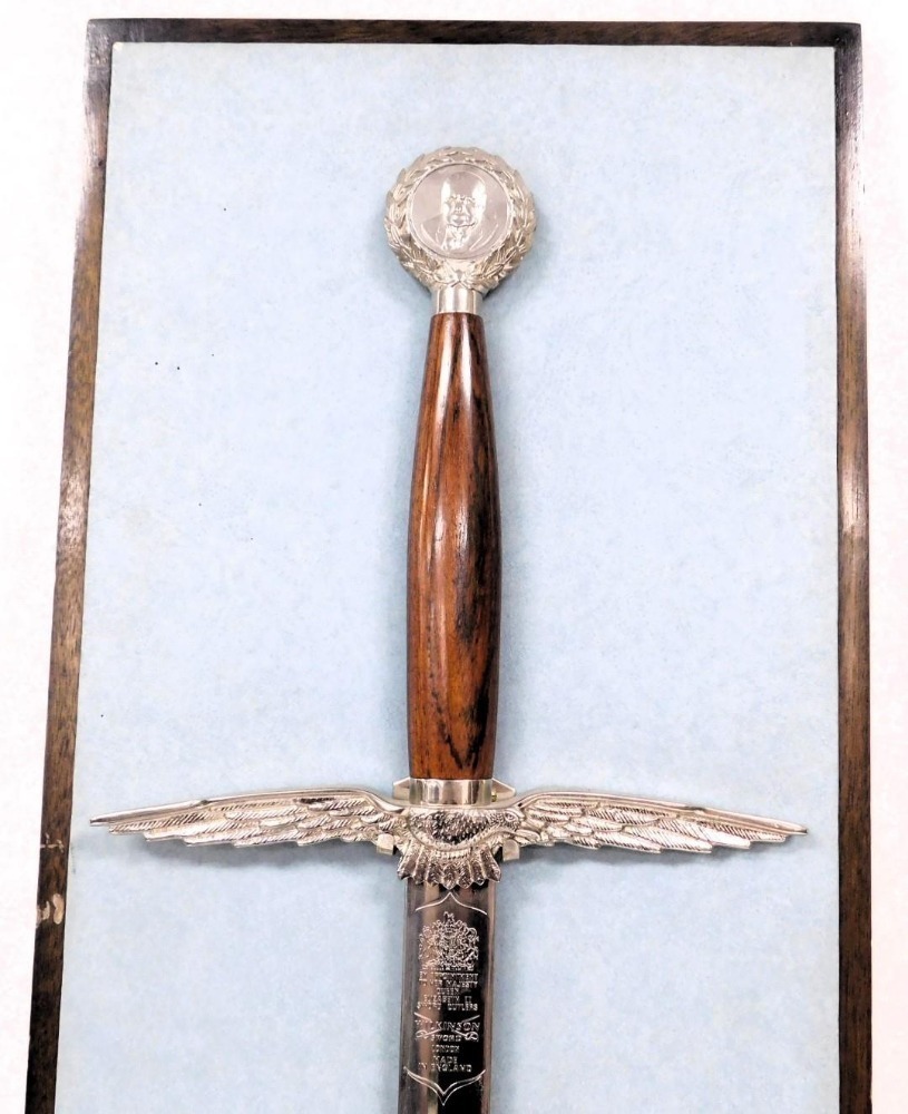 A Wilkinson's commemorative sword for the Battle of Britain, the wooden ...