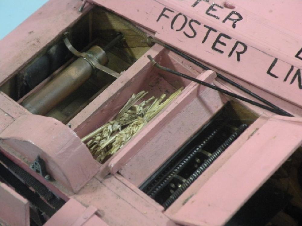 A scratch built model of a Foster of Lincoln threshing machine painted