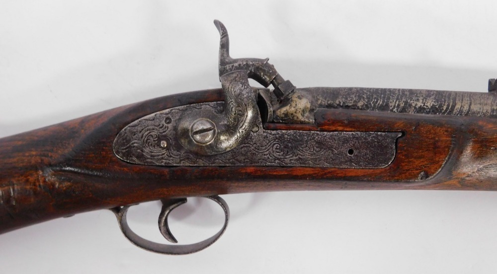A 19thC percussion muzzle loading musket, possibly 1833, the walnut ...