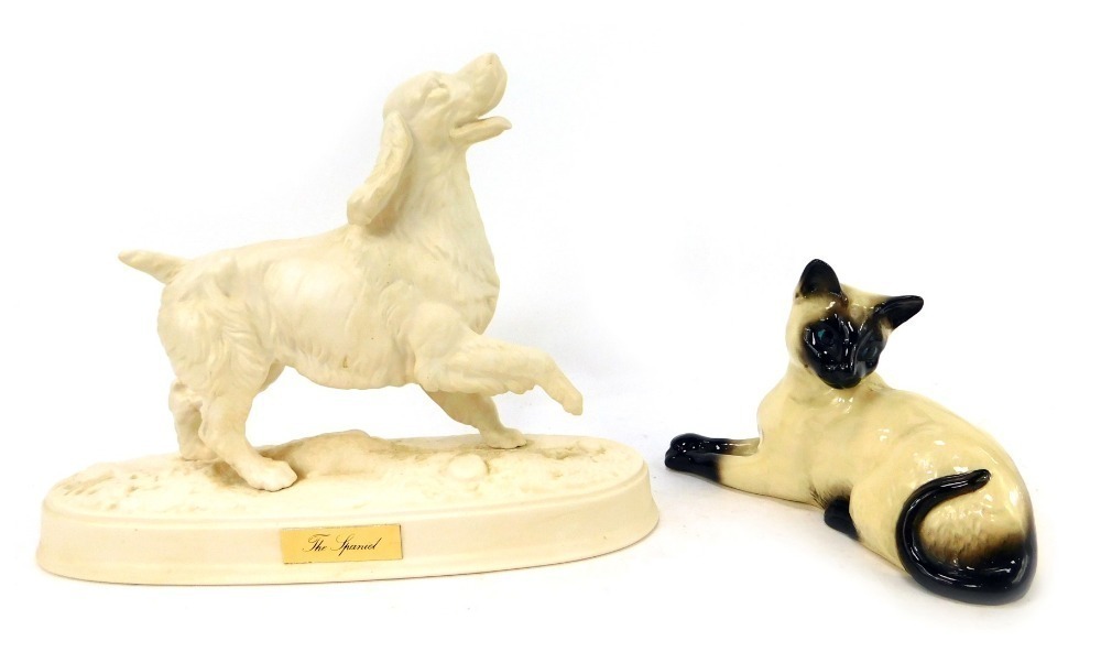 A Beswick matt porcelain figure of The Spaniel, mounted on an oval ...