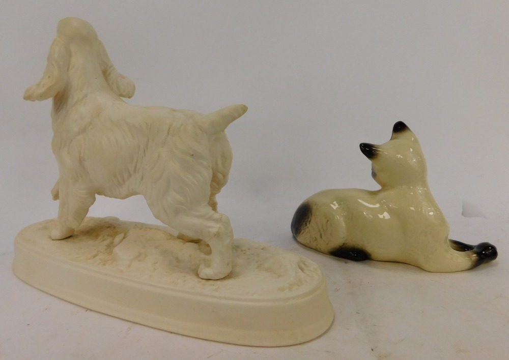 A Beswick matt porcelain figure of The Spaniel, mounted on an oval ...