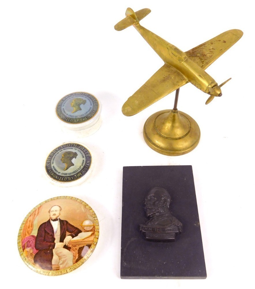 A brass model of a spitfire plane, on circular base, 15cm high ...