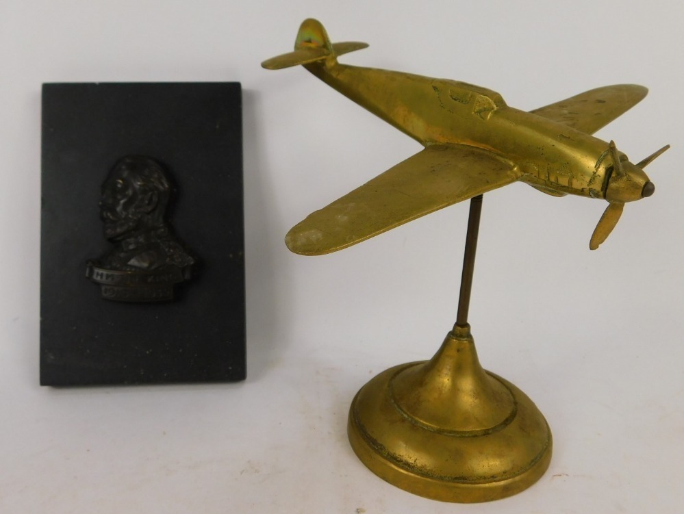 A brass model of a spitfire plane, on circular base, 15cm high ...