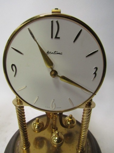 A Bentima carriage timepiece, with brass circular dial and Vincent and ...