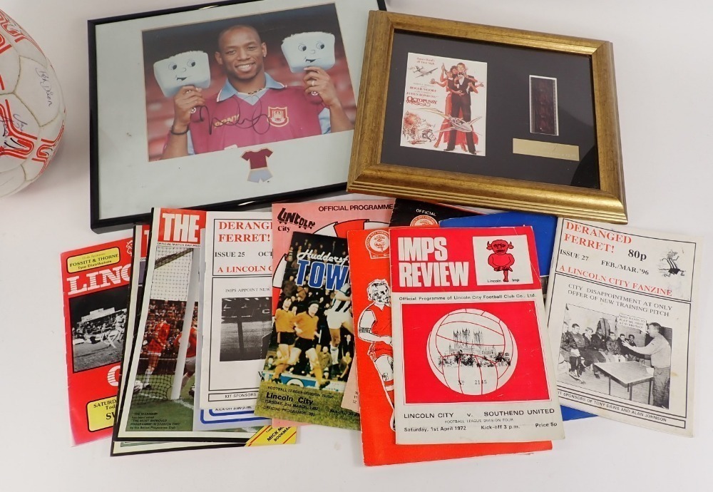 A collection of Lincoln City football memorabilia, to include a signed ...