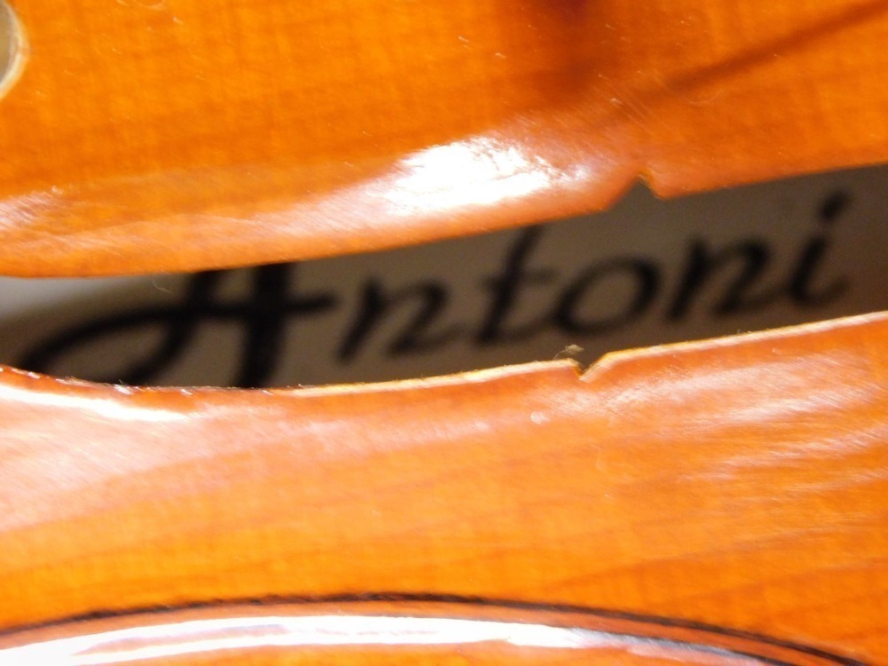 An Antoni model ACV30 two piece split back violin, bearing label in ...