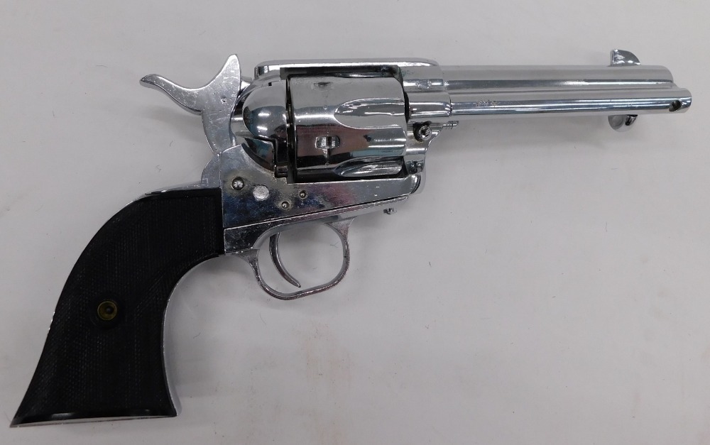 A Jonathan Silver Westerner replica revolver.