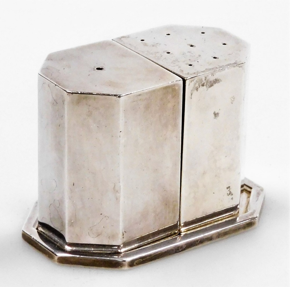A Tiffany & Co sterling silver cruet, on stand, of octagonal form, 176 ...