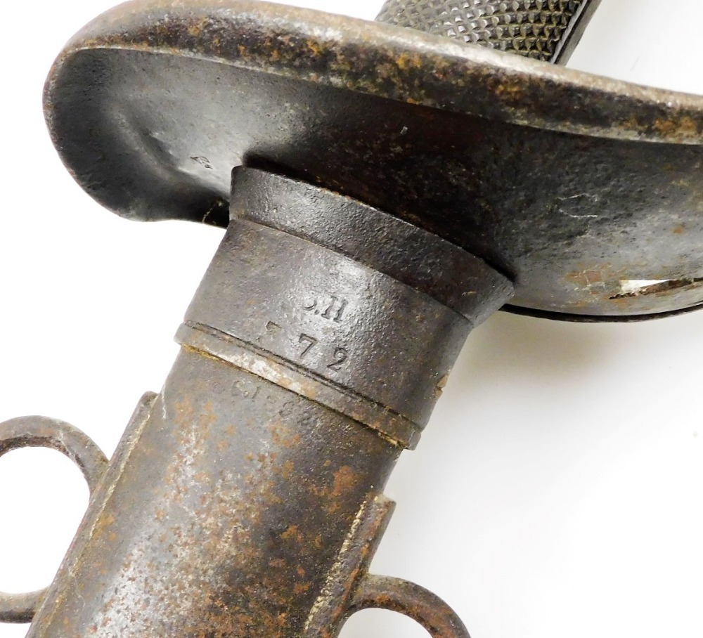 A British 1890 pattern cavalry sword, with W D stamp, metal scabbard ...