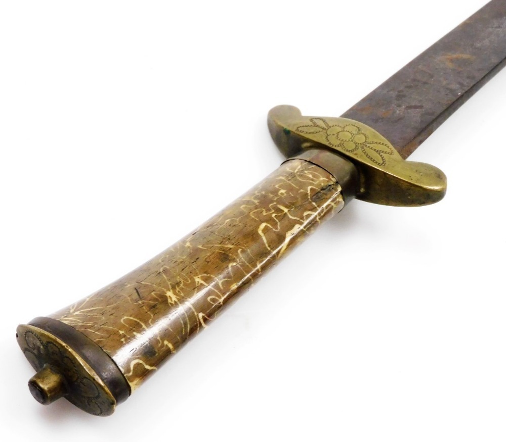 A Middle Eastern short sword, with an engraved brass cross guard, faux ...