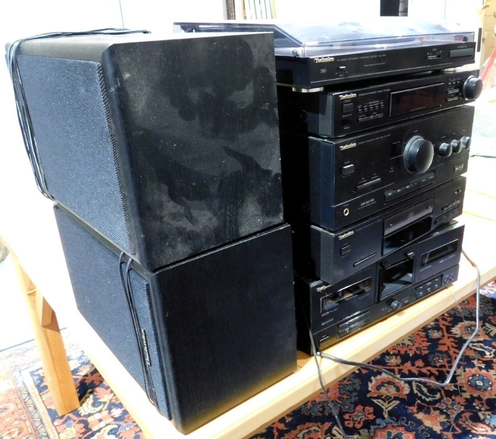 A Technic stacking stereo system with automatic turntable, stereo ...