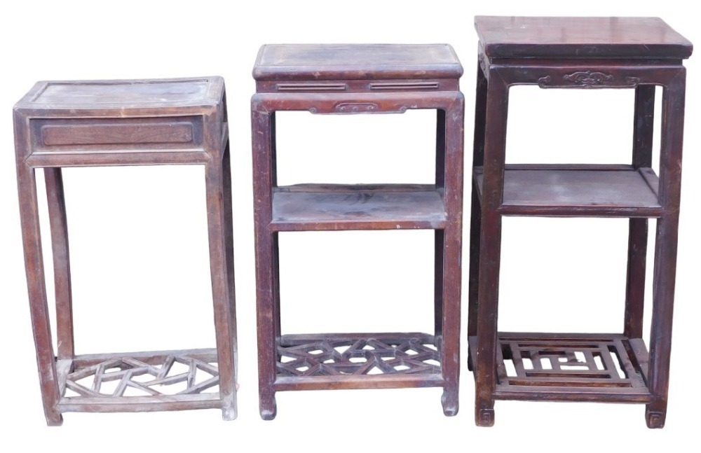 Three similar Chinese urn tables, each with a rectangular top, one with ...