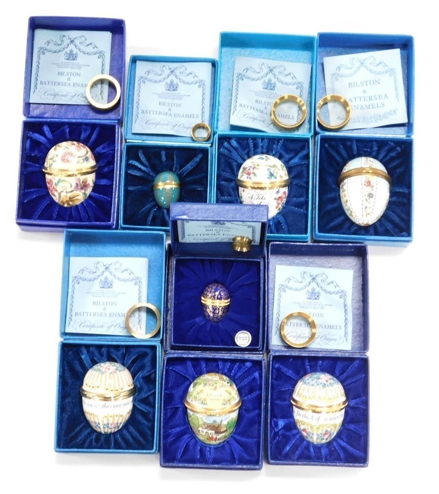 Eight Bilston & Battersea Enamels egg shaped trinket boxes, designed by ...