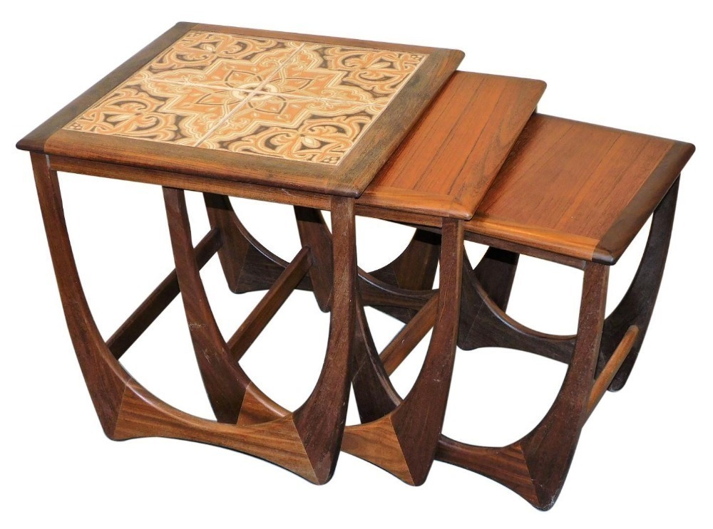 A G-Plan nest of teak occasional tables, the largest table with a four ...