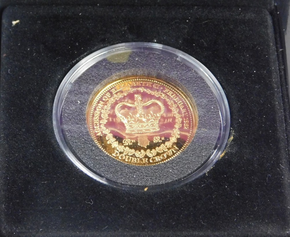 A Queen Elizabeth II 9ct gold 65th Anniversary Succession to the Throne ...