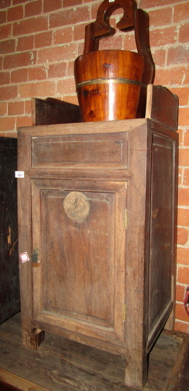 A Georgian mill cabinet, with a moulded top above six rails with single ...