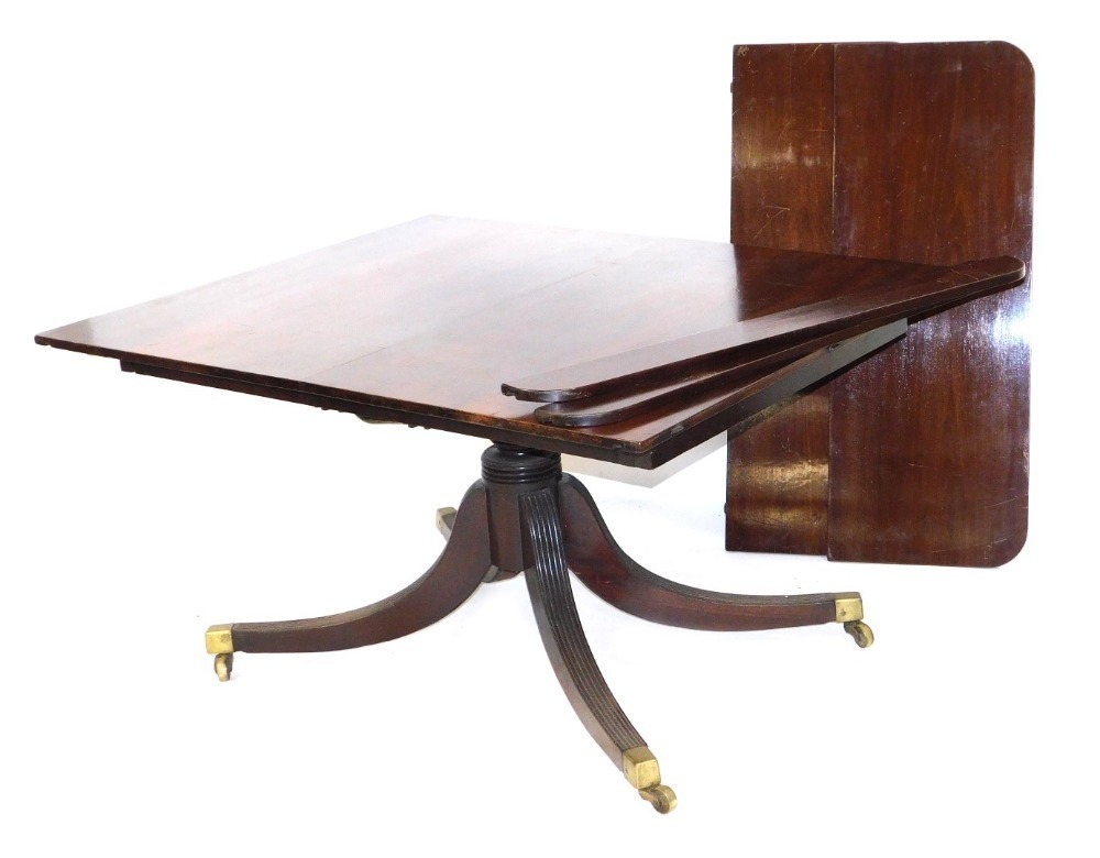 A 19thC mahogany extending dining table, the rectangular top with ...