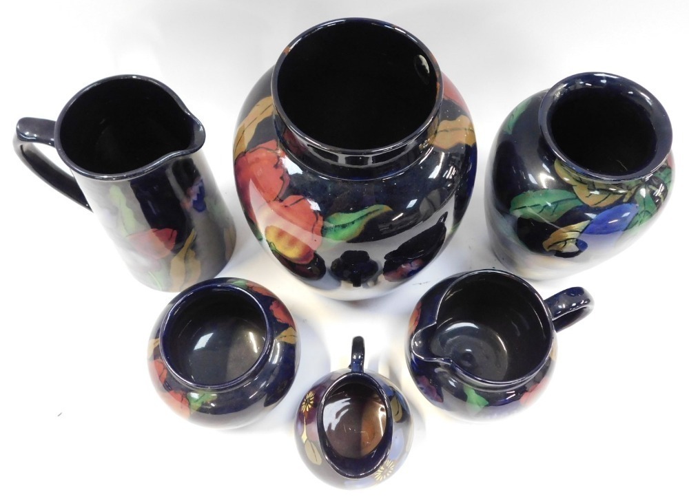 A group of Royal Stanley ware pottery, decorated in the Jacobean ...