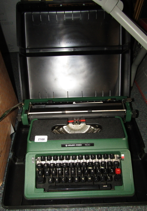 A Silver Reed 500 cased typewriter.