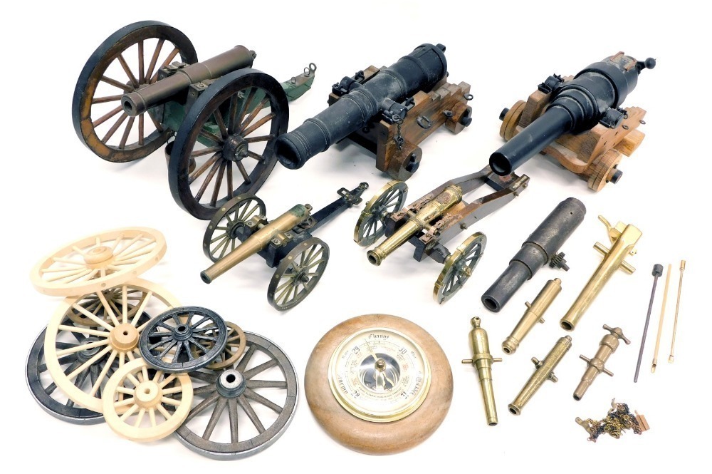 A collection of five model cannons, and various model cannon parts and ...
