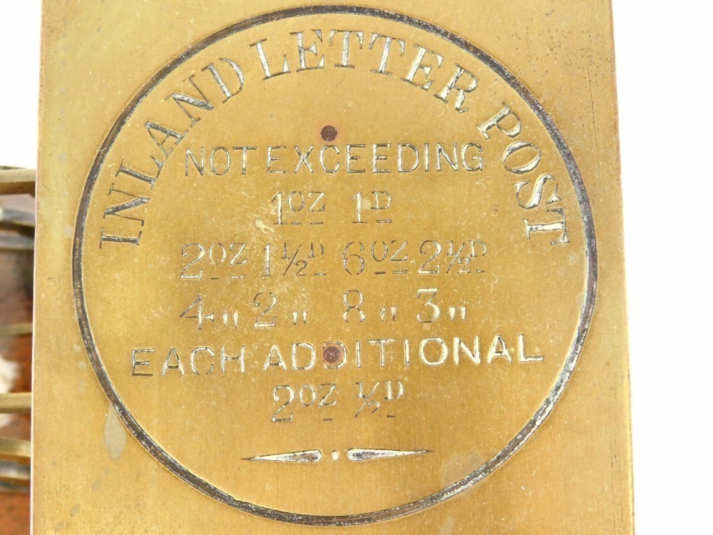 A set of early 20thC brass and oak letter scales, stamped Inland Letter ...