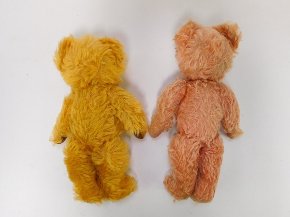 Two mid century Chad Valley Teddy bears, in yellow and pink, jointed ...