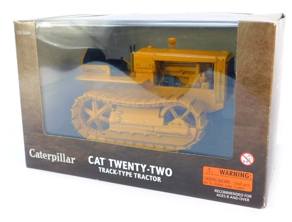 A Caterpillar Cat Twenty-Two track type diecast tractor, 1:16 scale, boxed.