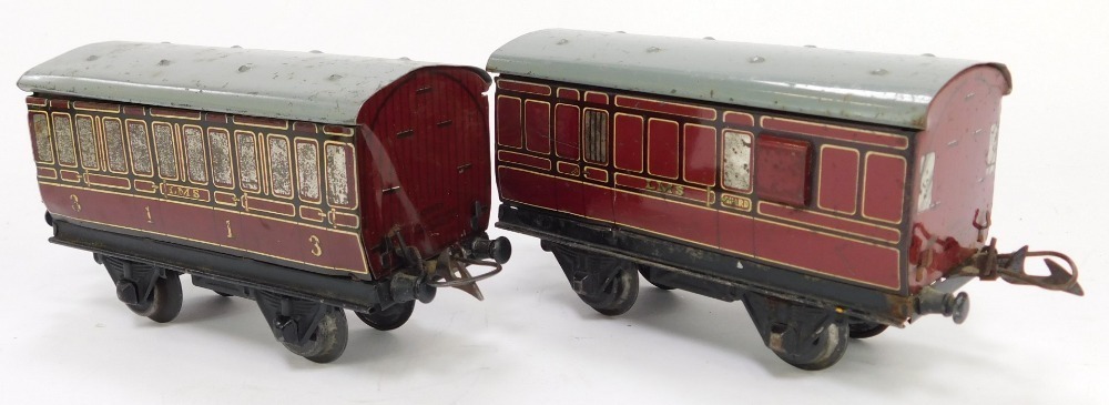 An O gauge tin plate locomotive, LNER 460, green livery, together with ...