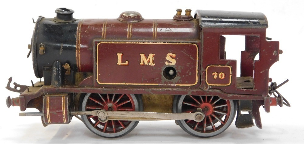 An LMS O gauge tinplate clockwork locomotive, in maroon livery, LMS 70 ...