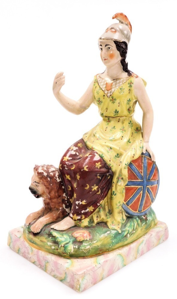 An early 19thC Staffordshire pottery figure of Britannia, in the manner ...