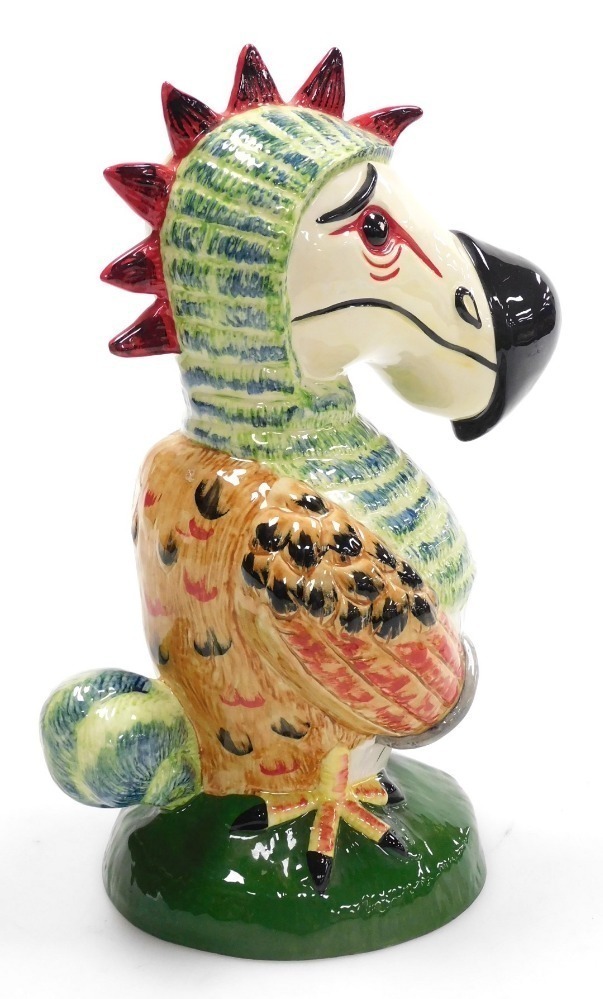 A Lorna Bailey pottery figure of a crying Dodo, it's wings cuffed ...