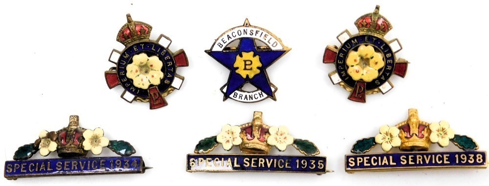 A group of Primrose League badges, two enamel badges with motto ...