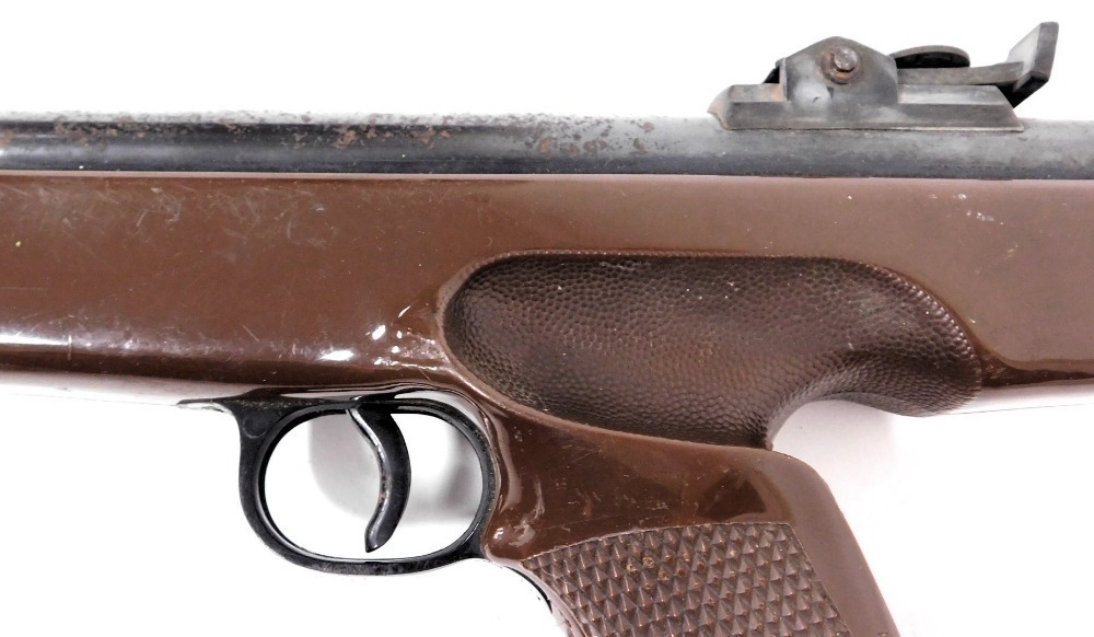 A Diana model 5 .177 calibre air pistol, with a brown plastic stock.