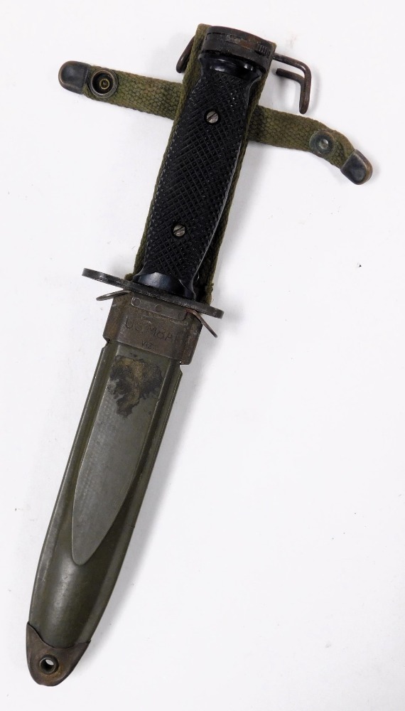 A US M8 bayonet, in a US M8 A1 scabbard.